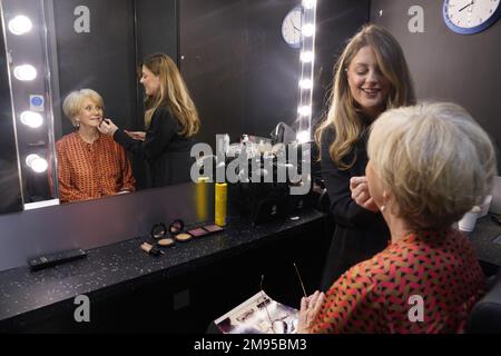 Former presenter Debbie Rix (right) in makeup before going on air as ...