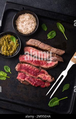 Different degrees of steak roasting. Steak with blood, medium to high ...