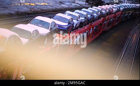New Volkswagen cars on a freight train at train station, Slovenia Stock ...