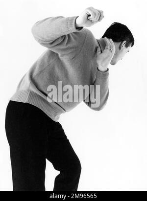 A man about to roll some dice Stock Photo - Alamy