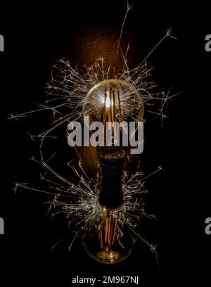 Sparkling sparkler, black background Stock Photo - Alamy
