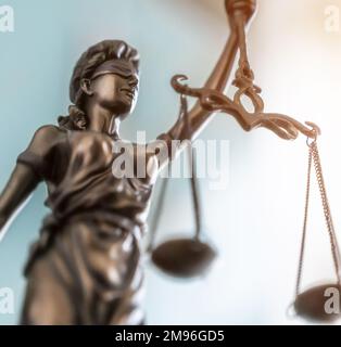Statue of lady justice on bright background - Side view with copy space ...
