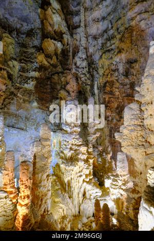 White ancient stalagmites closeup in the cages of Grotta di Frasassi ...