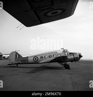 Avro Anson aircraft in flight, showcasing its design as a twin-engine ...