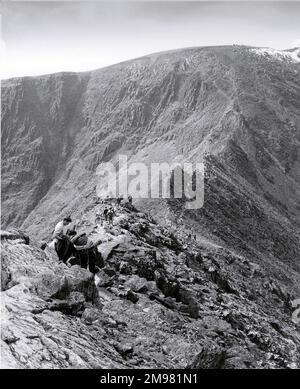 Walkers on Striding Edge, Helvellyn mountain, Cumbria Stock Photo - Alamy