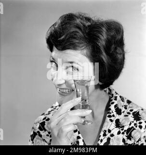 Advertisement for Emu sherry -- smiling female model (Yvonne Marsland ...