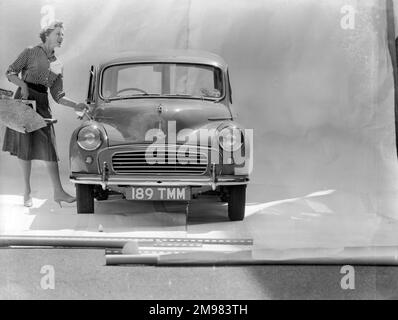Advertisement for National Benzole petroleum -- female model with motor ...