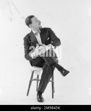 Advertisement -- male model posing (Phillip Webb Stock Photo - Alamy