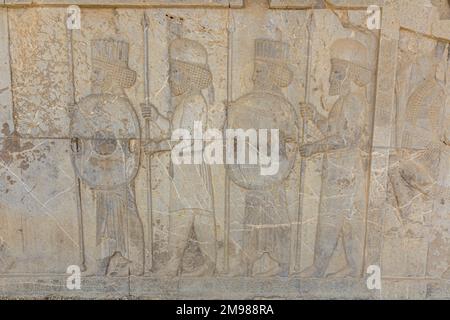 Immortal warriors bas relief in the ancient Persepolis, Iran Stock ...
