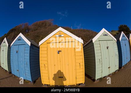 Distorted beach huts at Bournemouth, Dorset UK in January taken with ...