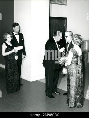 Sir George Gardner, RAeS President 1965-1966, prepares to cut the ...
