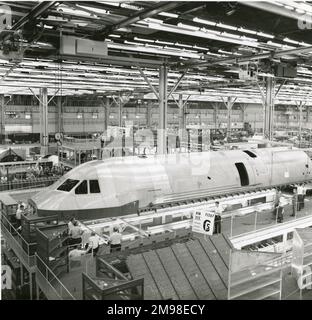 The forward fuselage of the first Lockheed C-5A Galaxy is moved to the ...