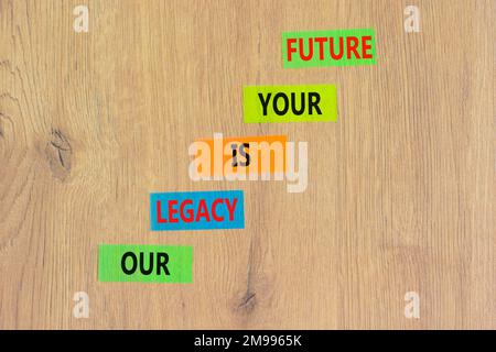 Legacy and future symbol. Concept words Our legacy is your future on wooden blocks. Beautiful ...