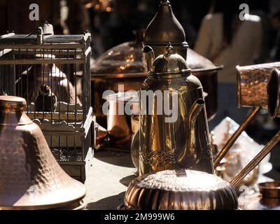 Copper ware shop with crockery, pots and pans in the metal work part of ...