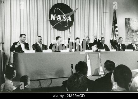 Malcolm Scott Carpenter, left, and John Glenn in front of a Mercury ...