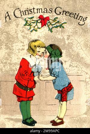 Under the mistletoe - Boy and girl kissing at Christmas 1898 Stock ...