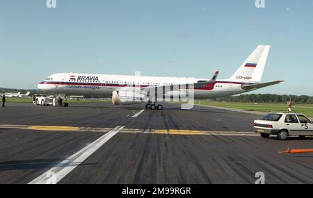 a Rolls-Royce RB-211-535 jet engine, wing and winglet flying near ...
