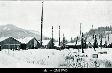 Native American Indian village with totem poles in Alaska Stock Photo ...