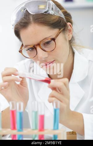 Woman lab technician take blood sample from test tube Stock Photo - Alamy