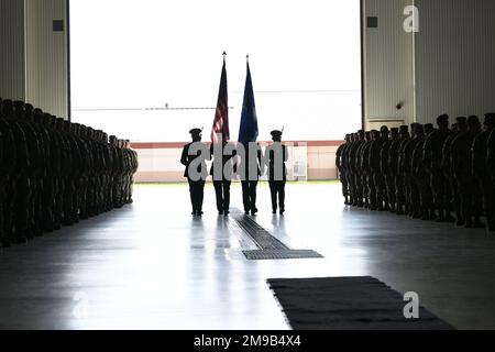 173rd Fighter Wing Honor Guard members perform a retreat ceremony at ...