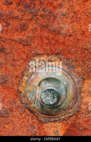Closeup of rusty metal combination lock fastened to latch in South ...