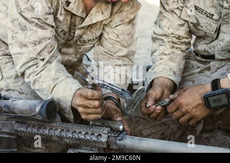 U.S. Marine Corps Cpl. Tadhg P. Kyne and Lance Cpl. Reed Mederos, scout ...