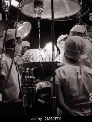 Medical professionals during surgery operating room. Group of surgeons ...