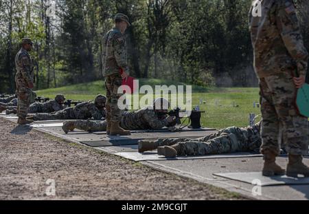 Army Reserve Best Squad Competitors assault a position on a casualty ...