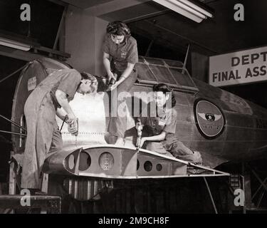1940s WOMAN WORKING IN WARTIME FACTORY TAKING MEASUREMENT ON LATHE ...