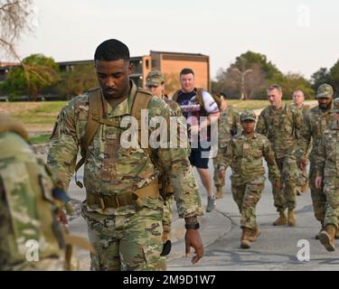 Members of the 47th Security Forces Squadron stand in front of a ...