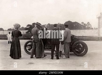 Hugh and Ethel Locke King and Colonel Holden in paddock area ...