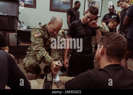 Combat Life Saver Instructor Staff Sgt. Kasey Culverson demonstrates to ...