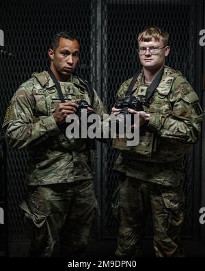 U.S. Army Spc. Jameson Harris, a visual information specialist assigned ...