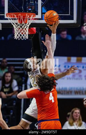 Clemson forward Ian Schieffelin (4) is fouled by Virginia forward Jacob ...