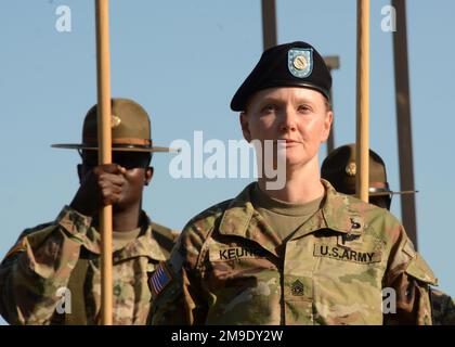 Command Sgt. Maj. Krista K. Keune leads a troop formation during the ...
