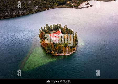 The autumn on Visovac Island and the Visovac Monastery in Krka National ...