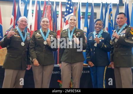 Command Sgt. Maj. Arthur "Cliff" Burgoyne Jr. passes the guidon to the ...