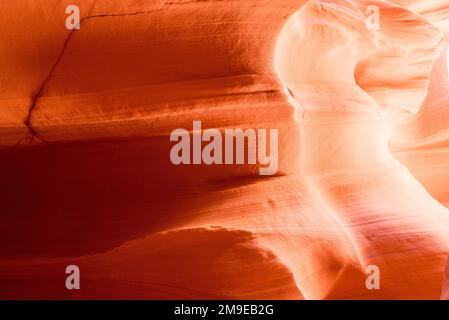 A closeup shot of a red cave illuminated by bright sunlight Stock Photo ...