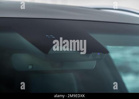 Rain and light sensor on the windshield of the car. Modern car safety ...