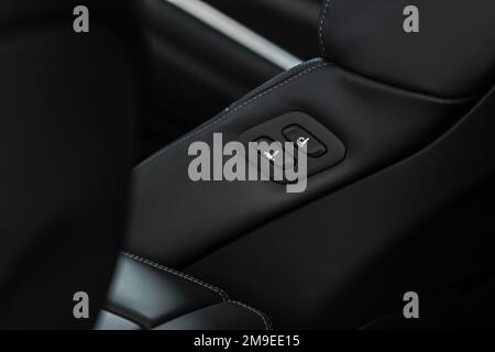 Walk-in seat switch. Electric car seat adjustment. Rear seat passenger ...