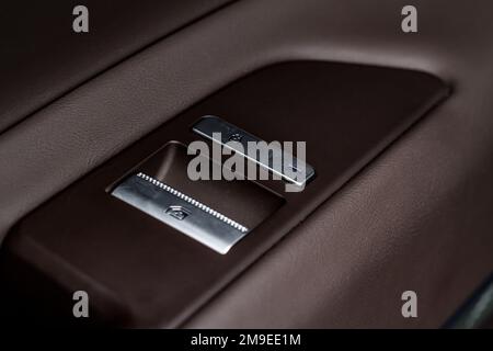 Lower car window buttons with control panel close up view Stock Photo ...