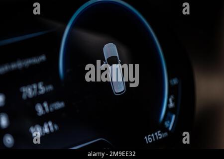 Color detail of an error message on a car dashboard. Door opened alarm ...