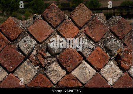 Decorative ancient Roman diagonal brick masonry wall construction ...