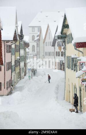 a view on snowy streets of the Alpine mountain village in the cold ...