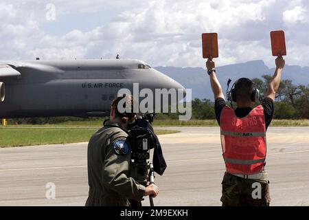 Medium long shot. AIRMAN First Class Brewster Esses, a MH-60 Pave Hawk ...