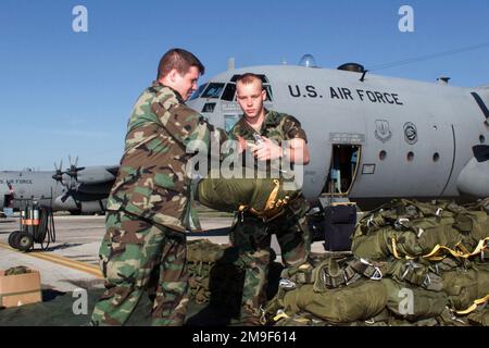 Right side profile medium shot as multinational military members of the ...