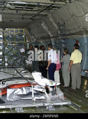 Straight on rear view medium shot as multinational firefighters ...