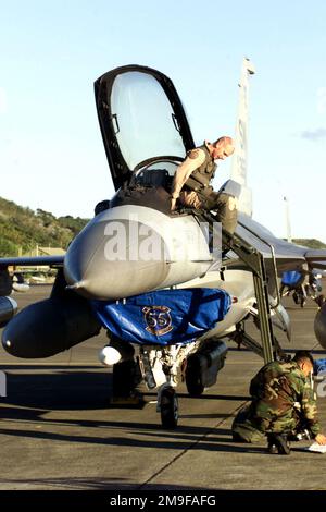 US Air Force Captain Vincent Cyran prepares to exit his F-16CJ aircraft ...