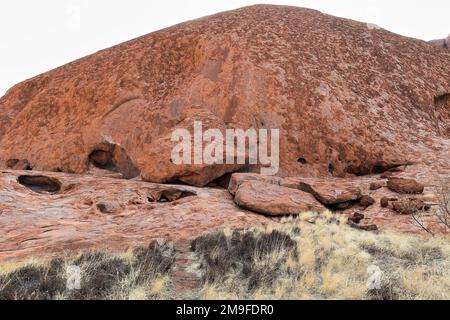 413 Hole-caves at the foot of Uluru-Ayers Rock seen from the base walk ...