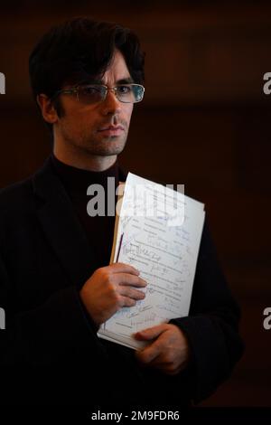 Actor Conor O'Kane holding a signed copy of the Good Friday Agreement ...